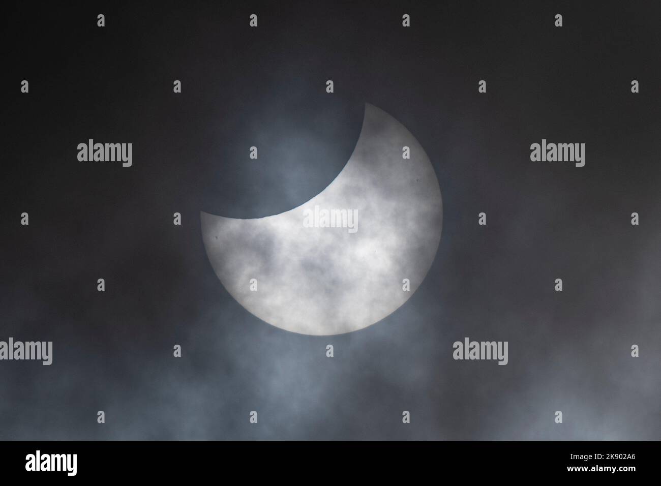 Berlin, Germany. 25th Oct, 2022. The sun is partially covered by the ...