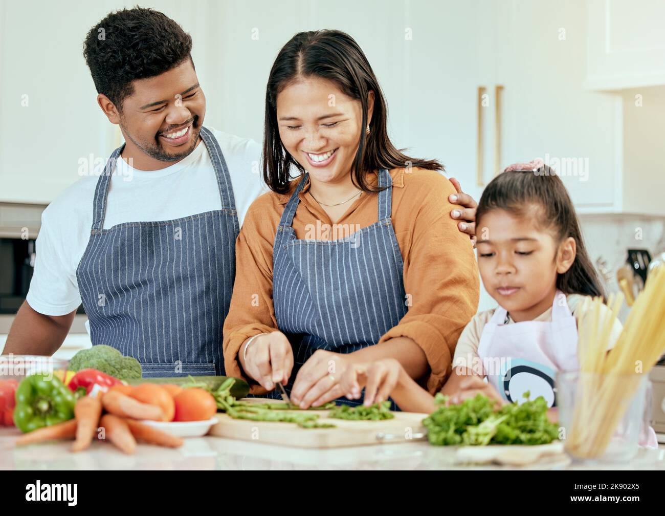 Family, food and cooking in kitchen for health, wellness and nutrition ...