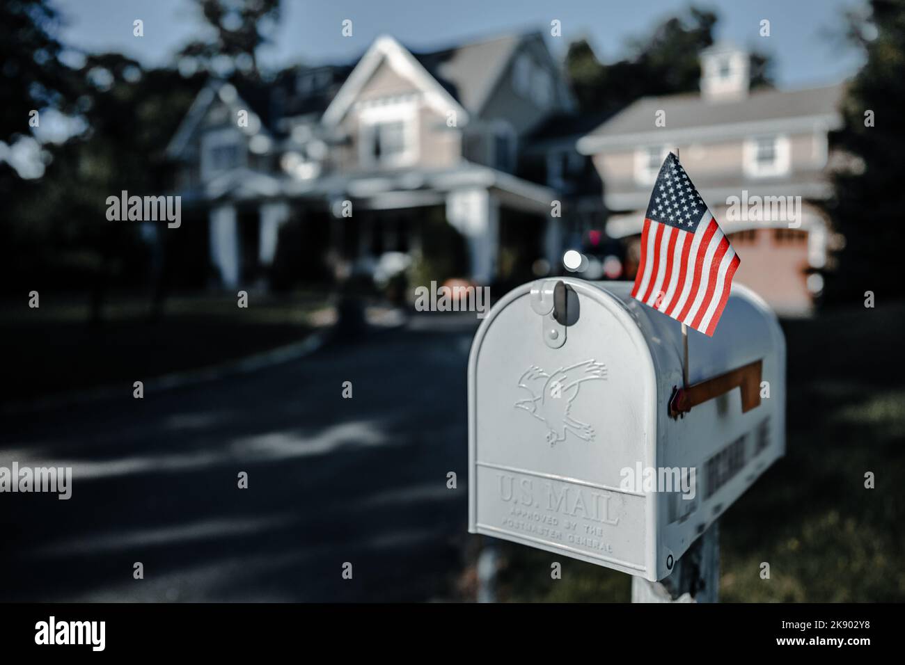 A typical American mailbox with USA flag in a shallow focus Stock Photo ...