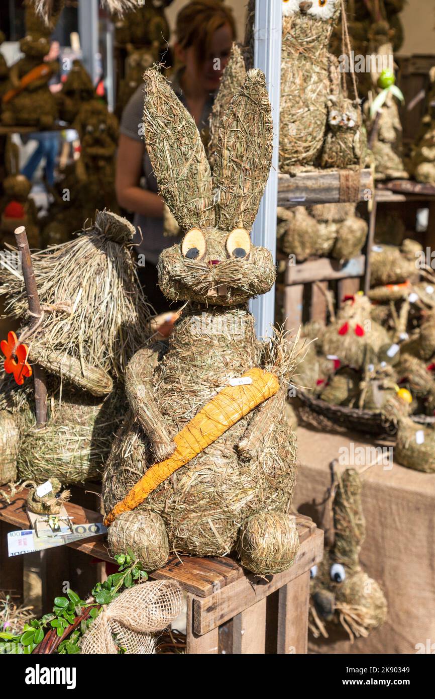 Wiesbaden, Germany - April 10, 2011: straw rabbit with carrot sitting ...