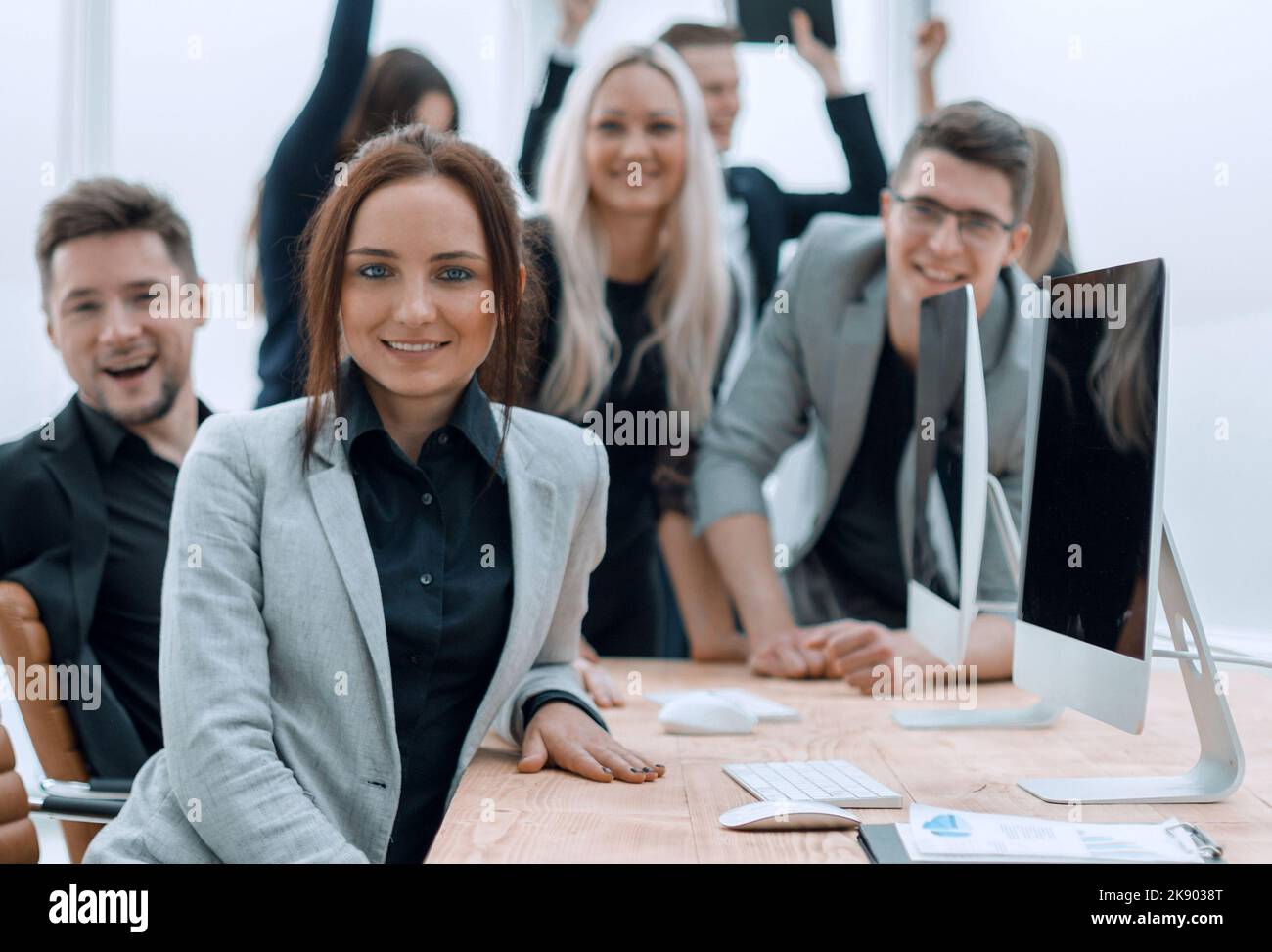 fun group of young employees in the workplace Stock Photo - Alamy