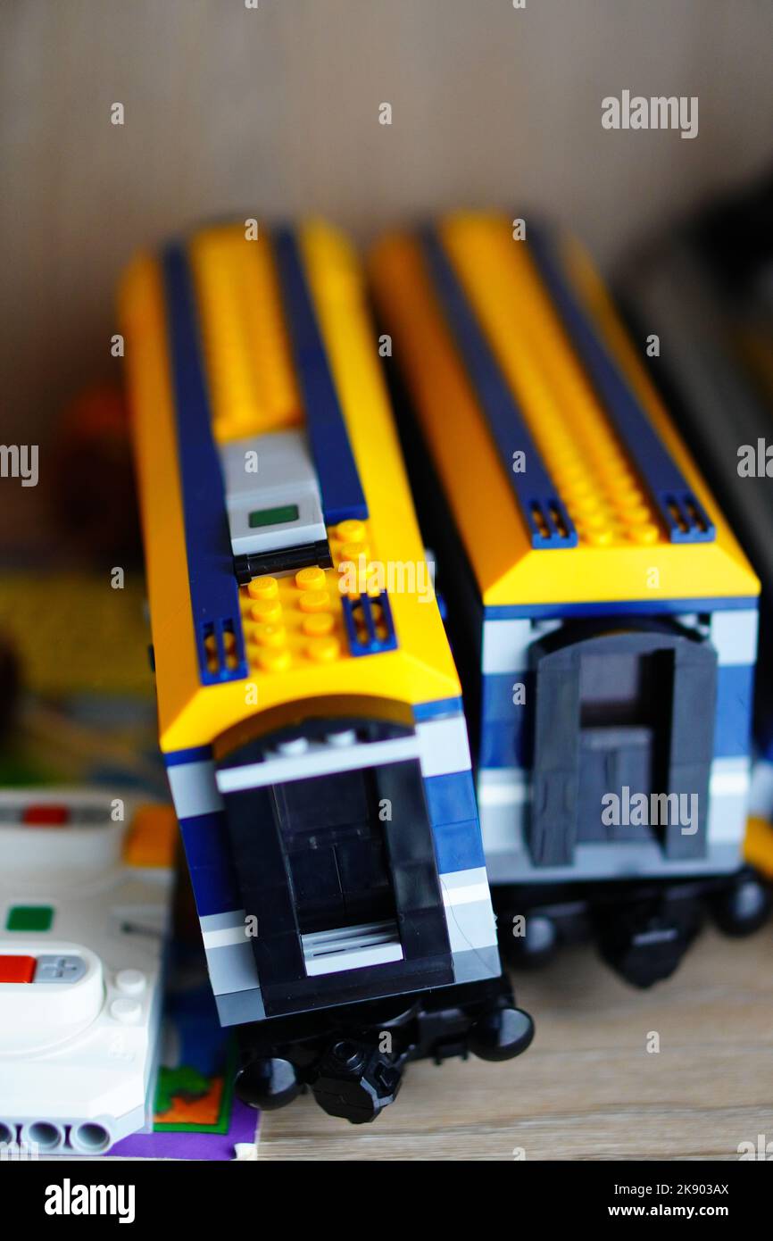 A Lego brand toy electric train on a messy shelf Stock Photo - Alamy