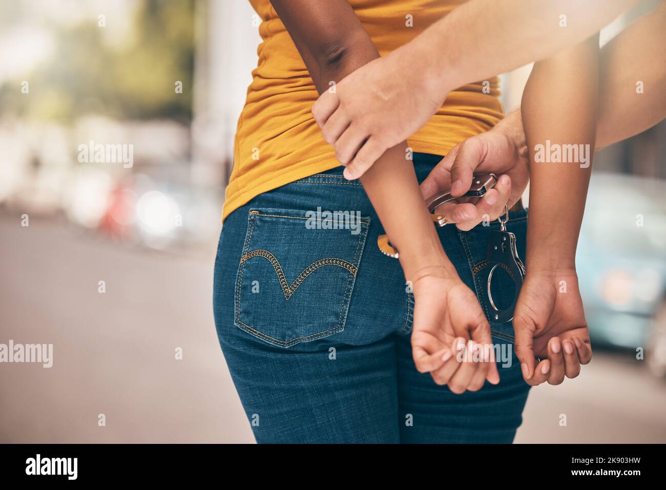 Handcuffs, police officer and criminal black woman during arrest for ...