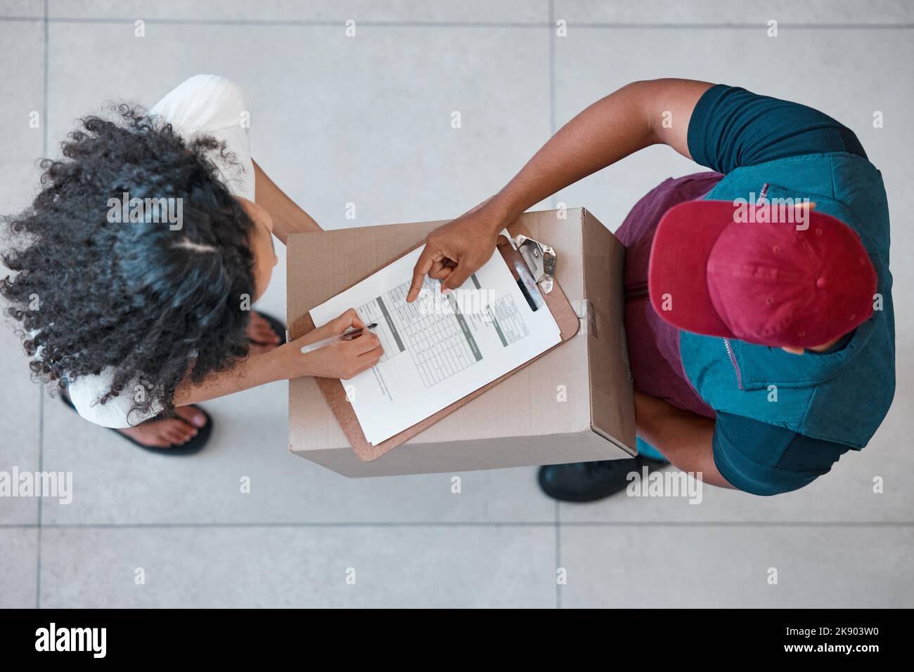 Delivery, shipping and logistics with a woman customer and man courier ...