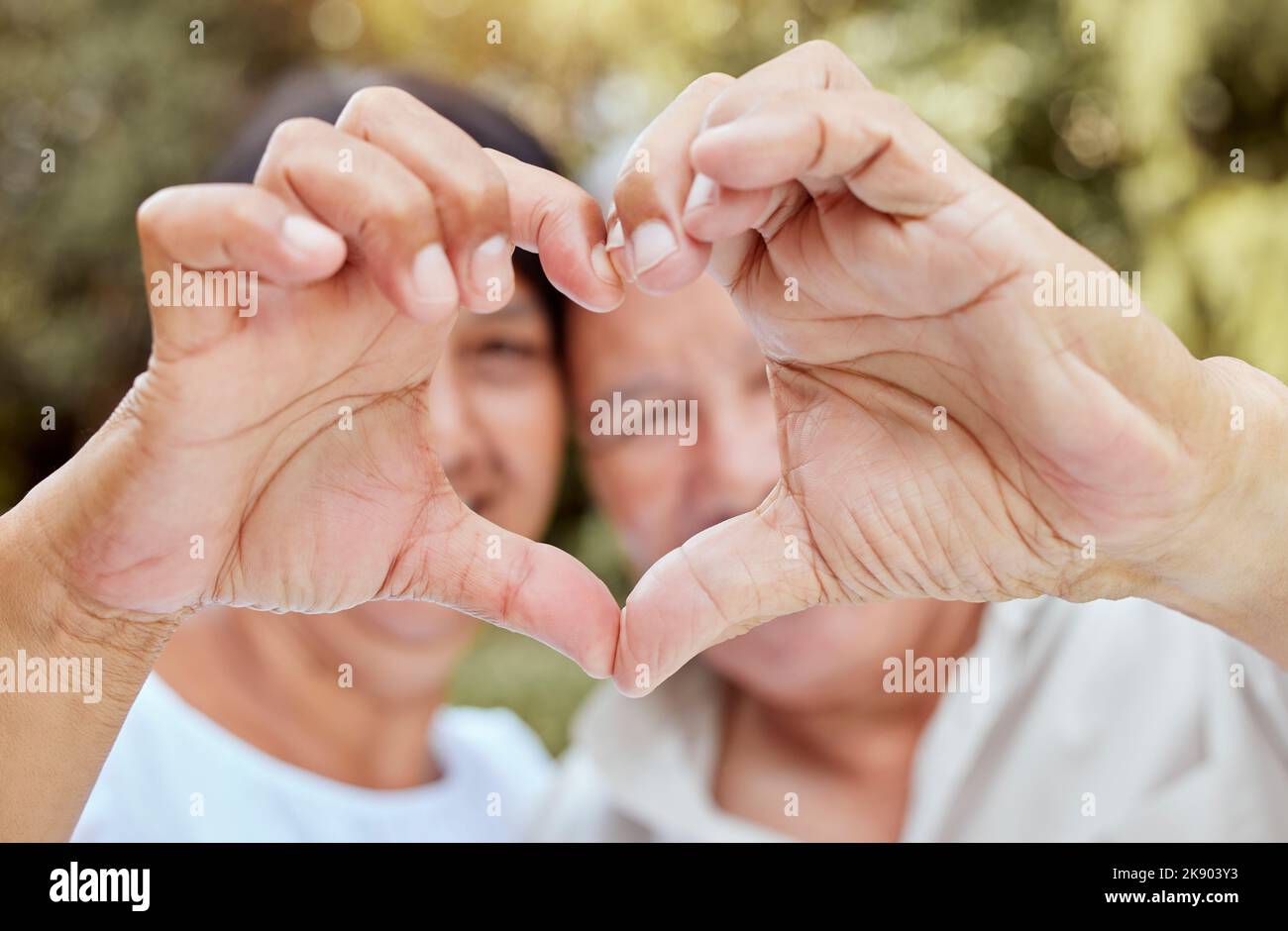 Heart hands, love and senior couple, happiness and kindness, trust and ...