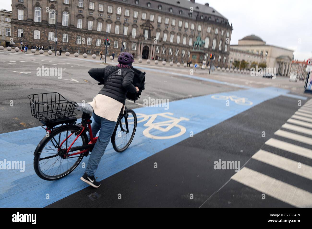 Copenhagen/Denmark/25 October 2022/Person bikes on bike lane infron ...
