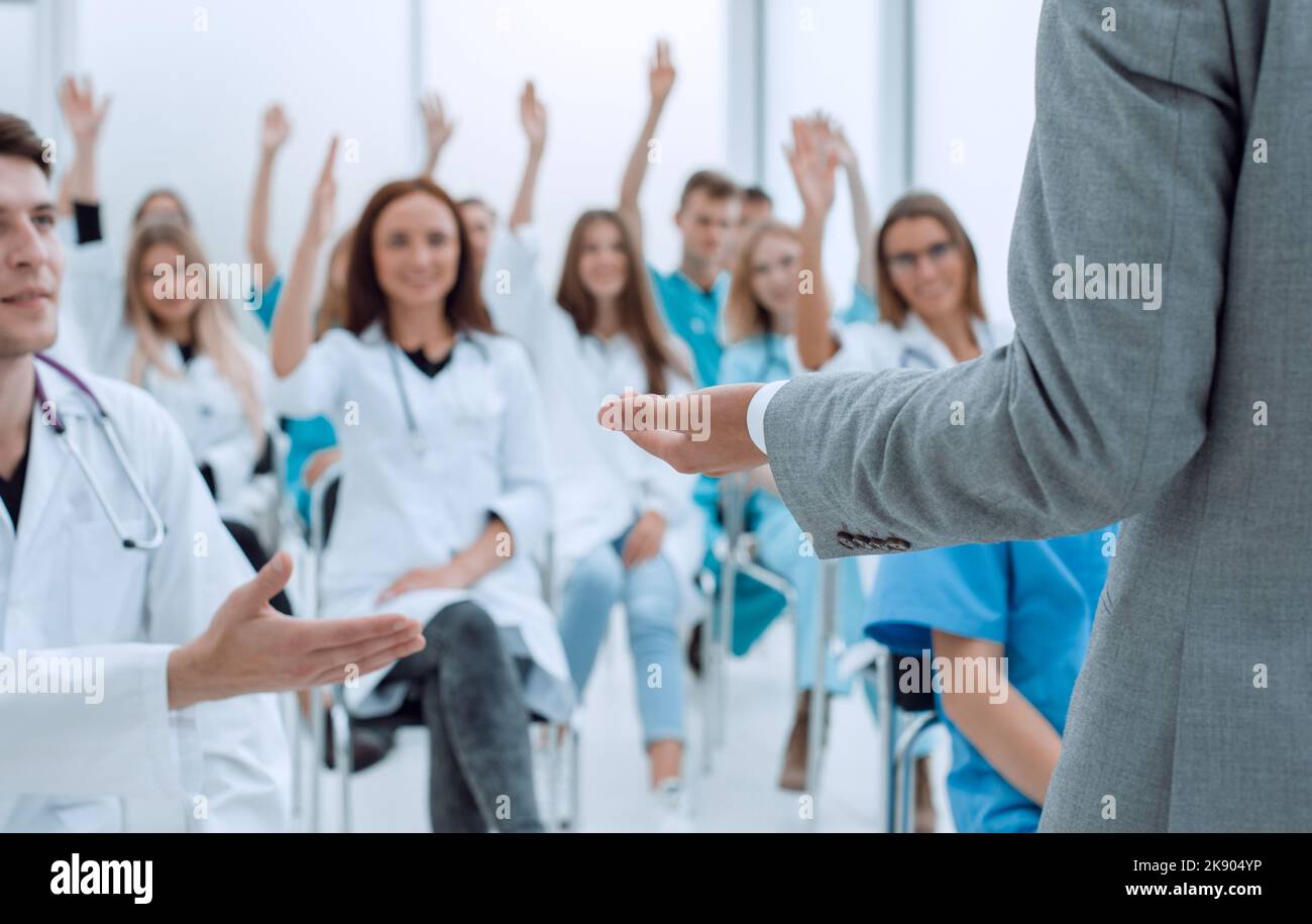 top view. a group of smiling doctors pointing at you Stock Photo - Alamy