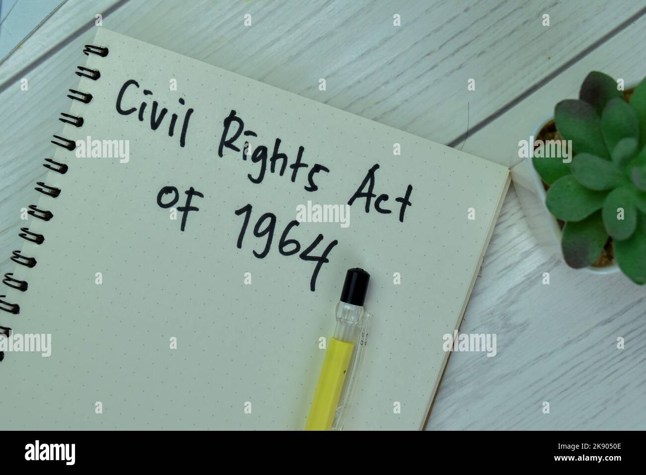 Concept of Civil Rights Act of 1964 write on a book isolated on Wooden ...