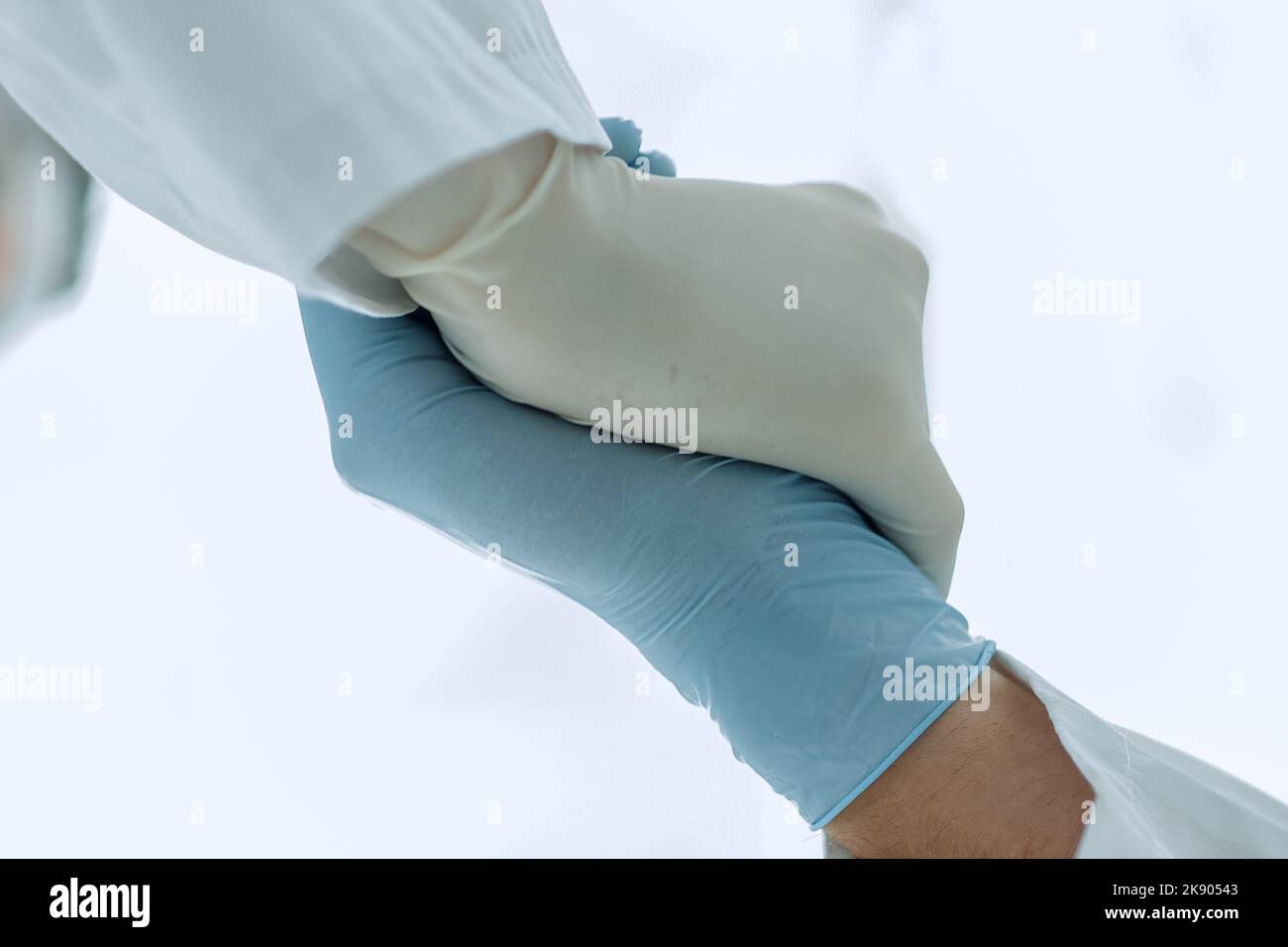 two scientist Shake hands after test completed Stock Photo - Alamy