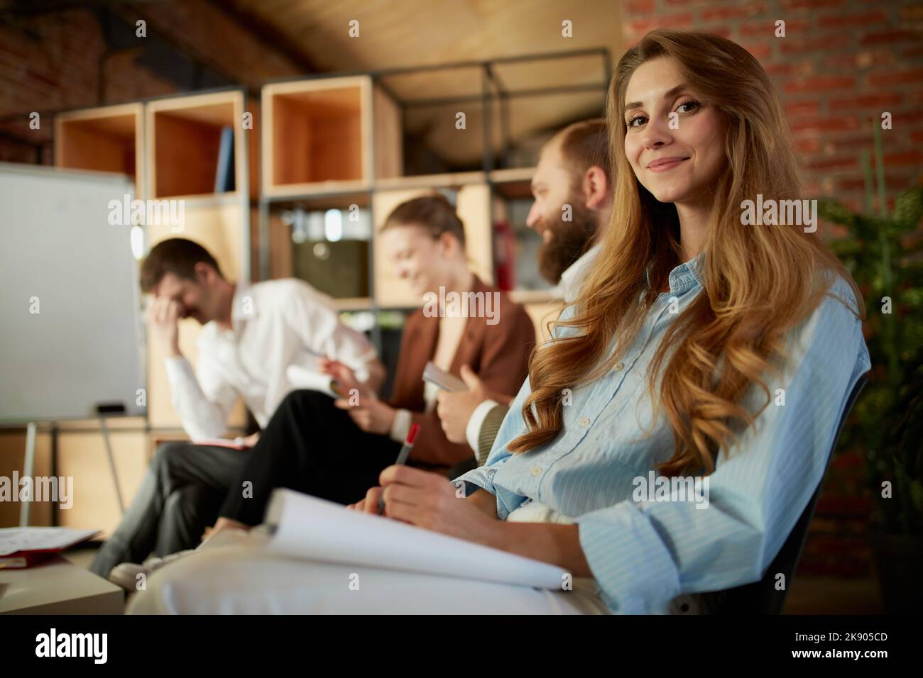 Focus on young and successful business lady. Happy smart girl in ...