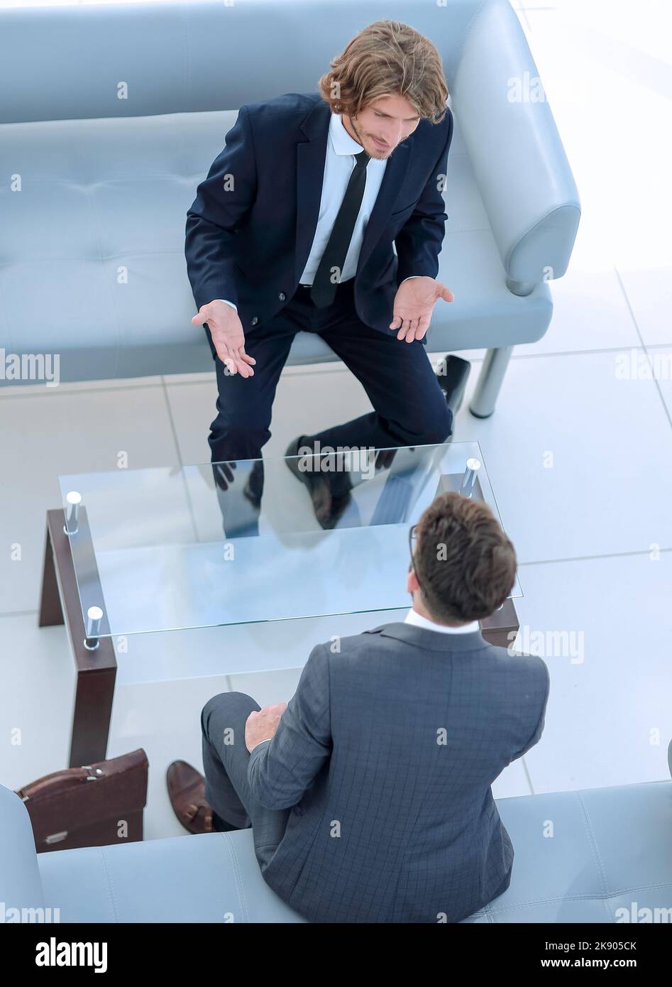 dialogue between two business people Stock Photo - Alamy