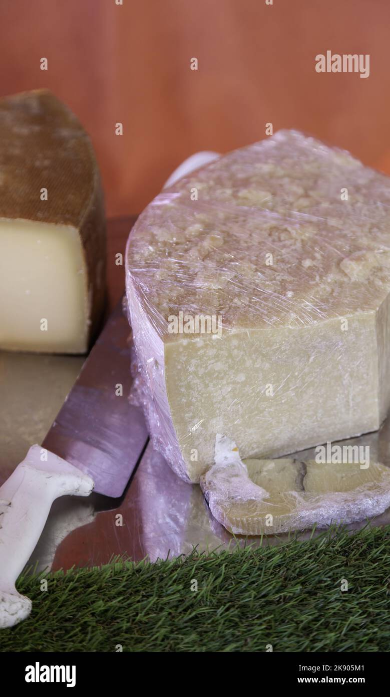 Detail of a dry cheese hi-res stock photography and images - Alamy