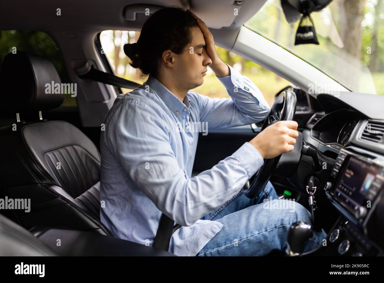 Businessman rubbing eyes hi-res stock photography and images - Alamy