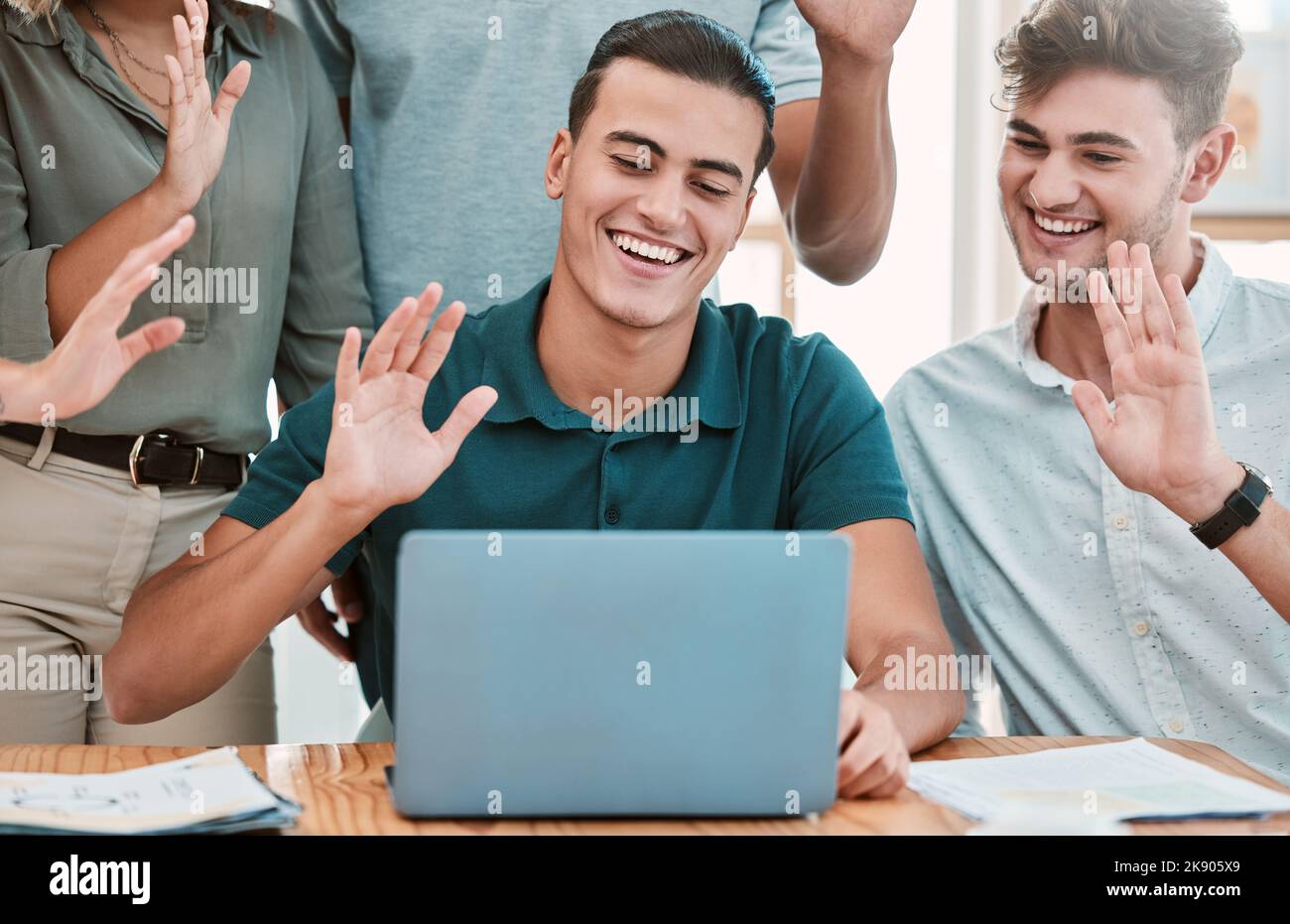 Wave, business and employees on a video conference on a laptop in an ...