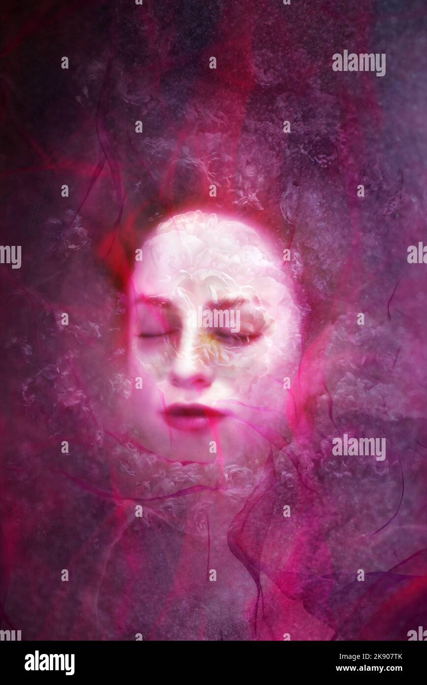 A peaceful face of a sleeping woman is covered and surrounded in ...