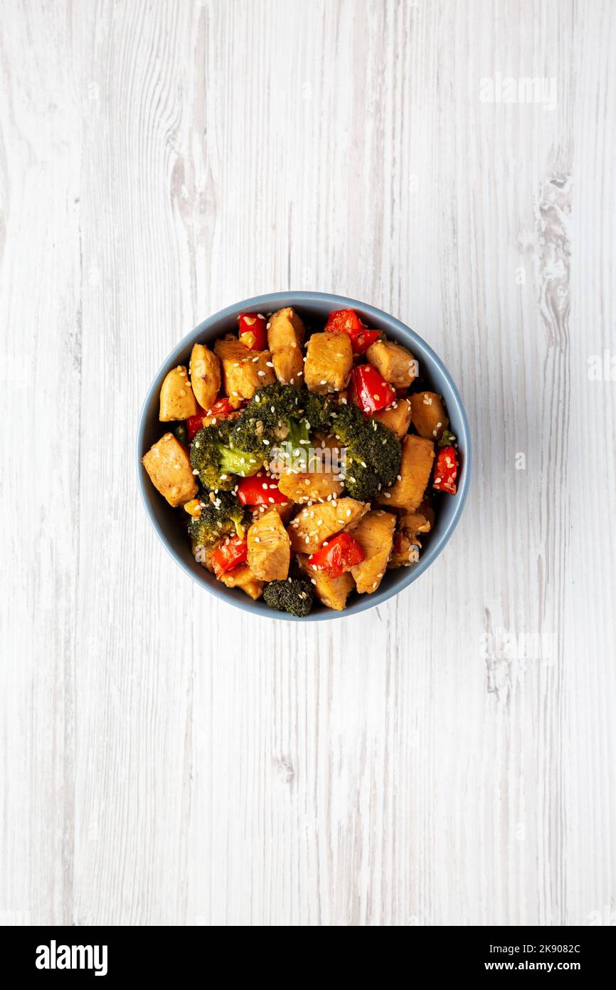 Homemade One-Pan Chicken And Broccoli Stir-Fry in a Bowl on a white ...