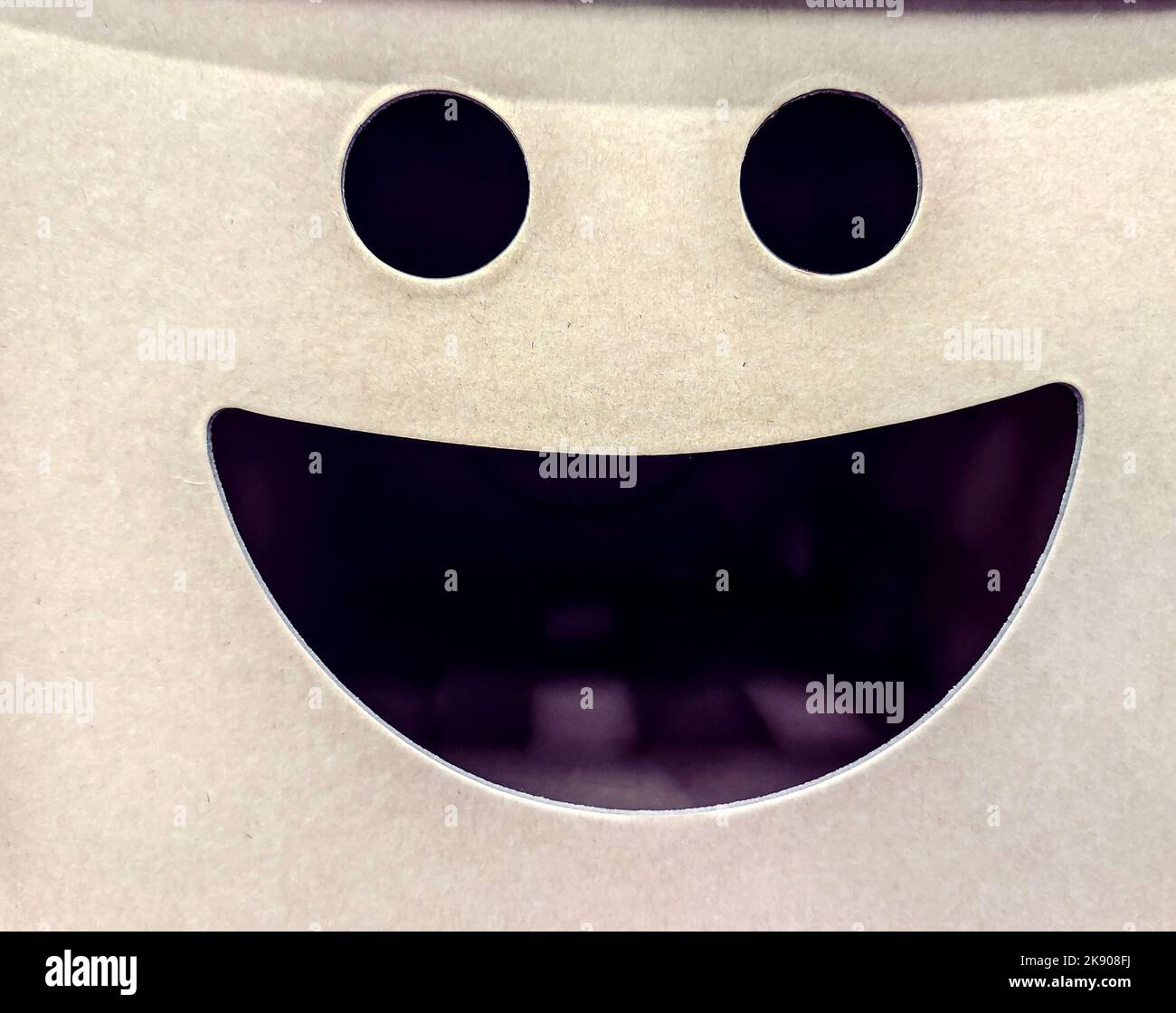 Cardboard face with gestures on colored background Stock Photo - Alamy