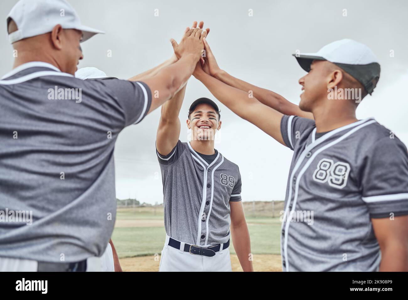 High five, baseball player team and training motivation together in ...