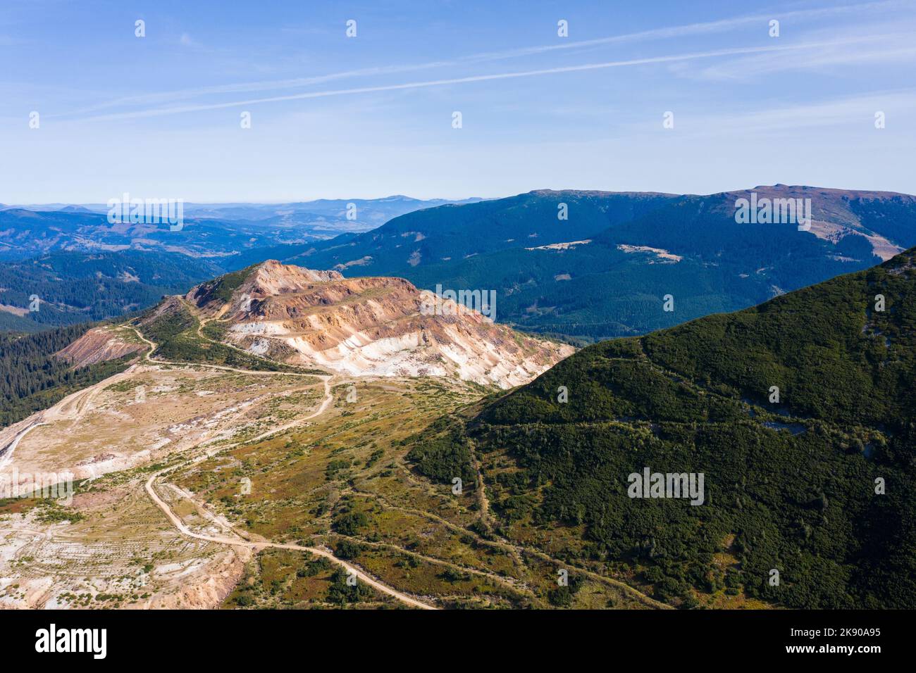 Stunning view of blue sky over layered mountain ranges and valley ...