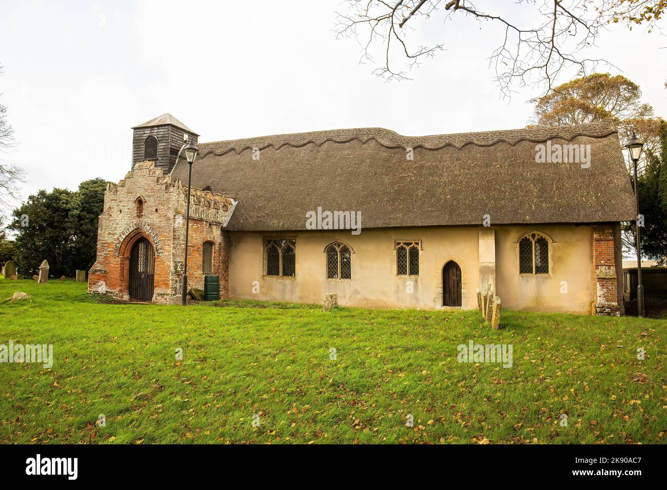 A closeup of an ancient red brick Tudor porch in Ixworth Thorpe ...
