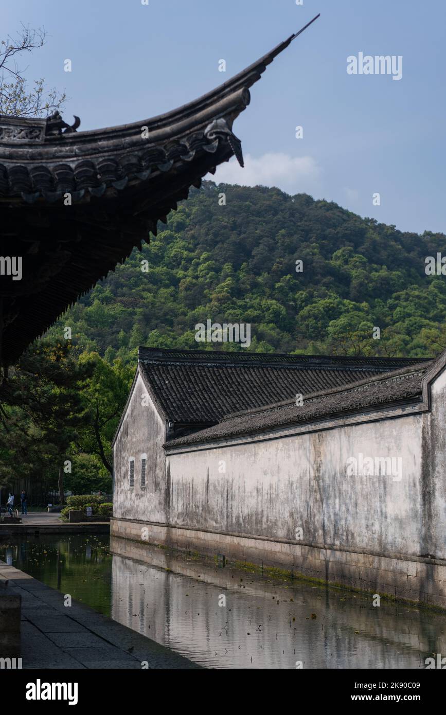 A vertical old Chinese building on the surface of water in Shaoxing ...
