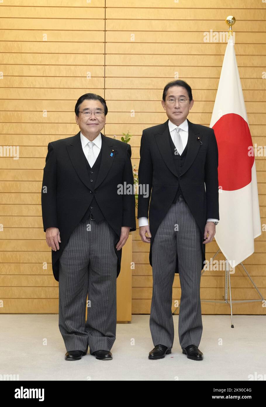 Japan's new economic revitalization minister Shigeyuki Goto (L) poses ...
