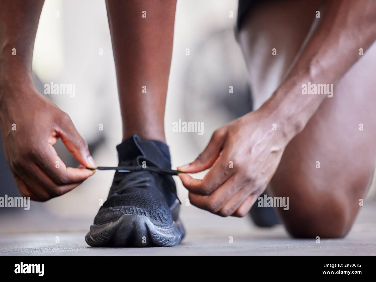 Fitness, hands and sports man with running shoes for training, cardio exercise and workout ...