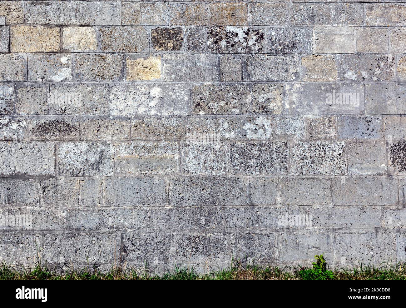 Old weathered wall made of grey bricks Stock Photo - Alamy