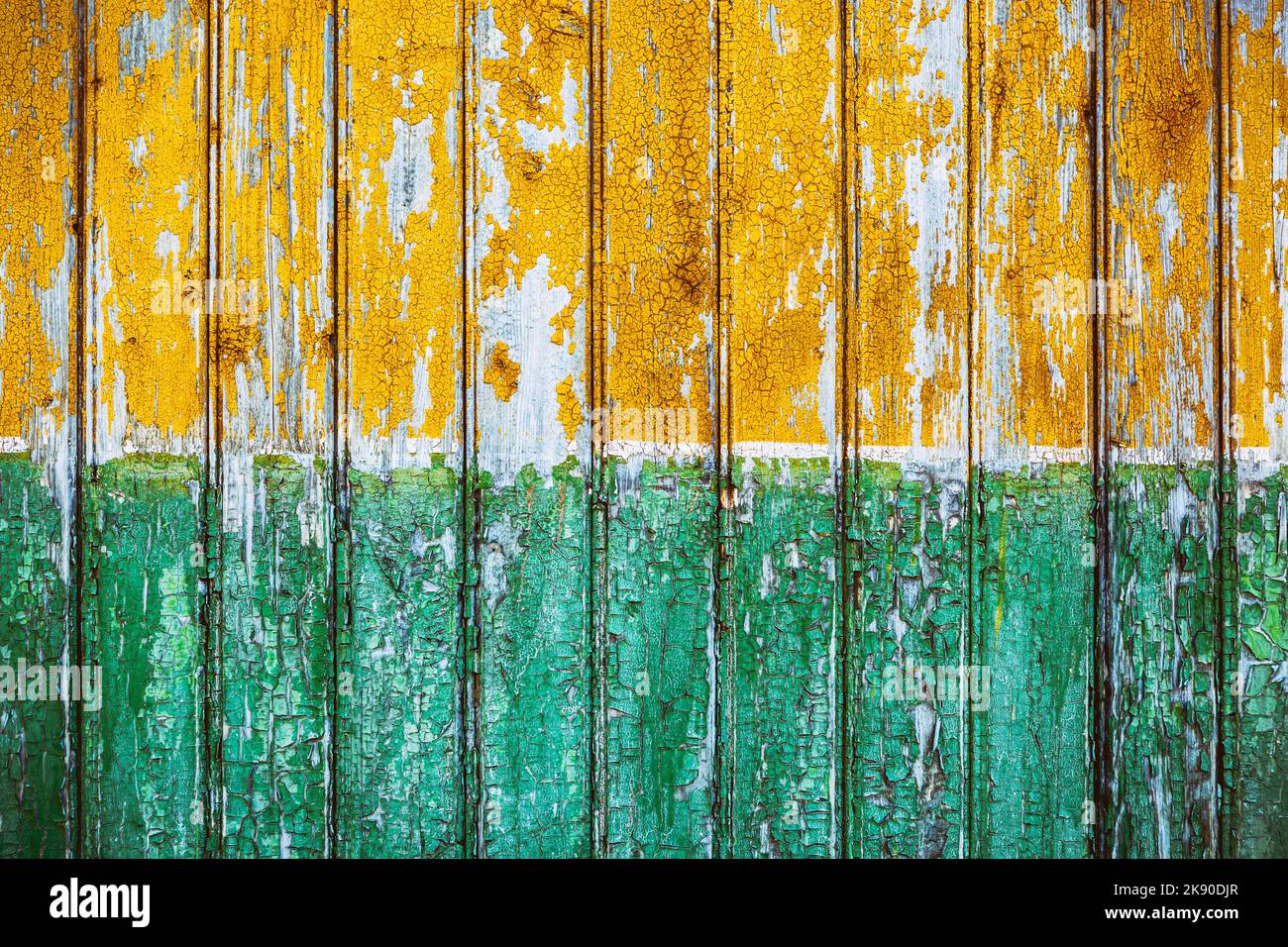 Group of vertical wooden panels painted yellow and green. Vintage ...