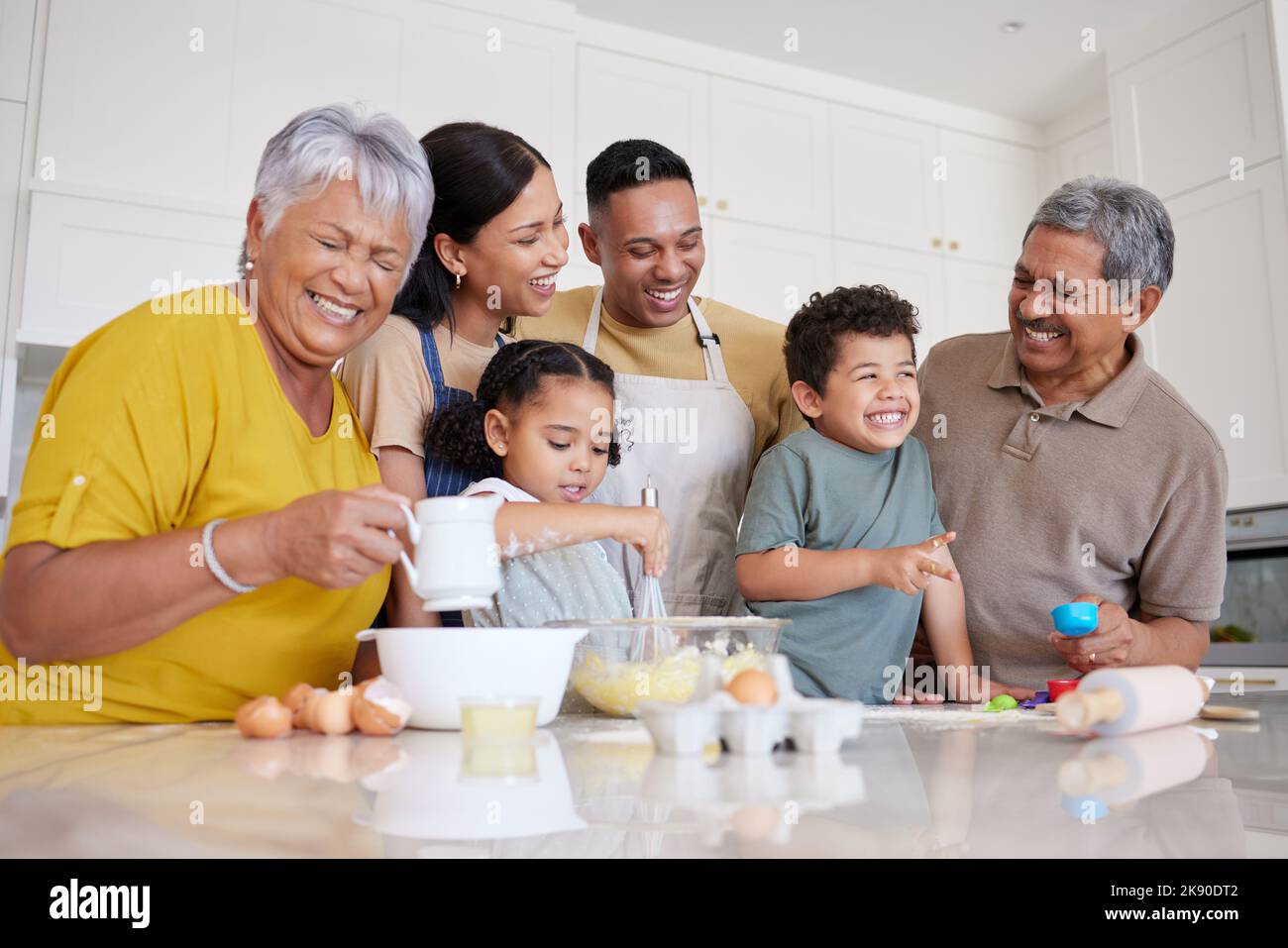 Baking, comic and big family in the kitchen for food, cooking and happy ...