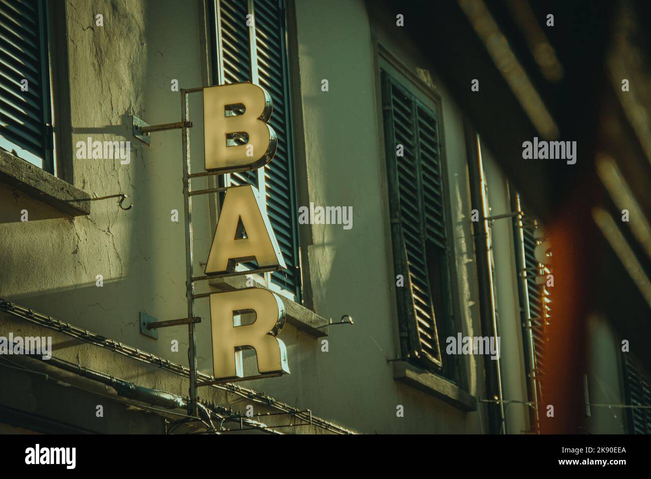 An old Bar sign on the wall Stock Photo - Alamy