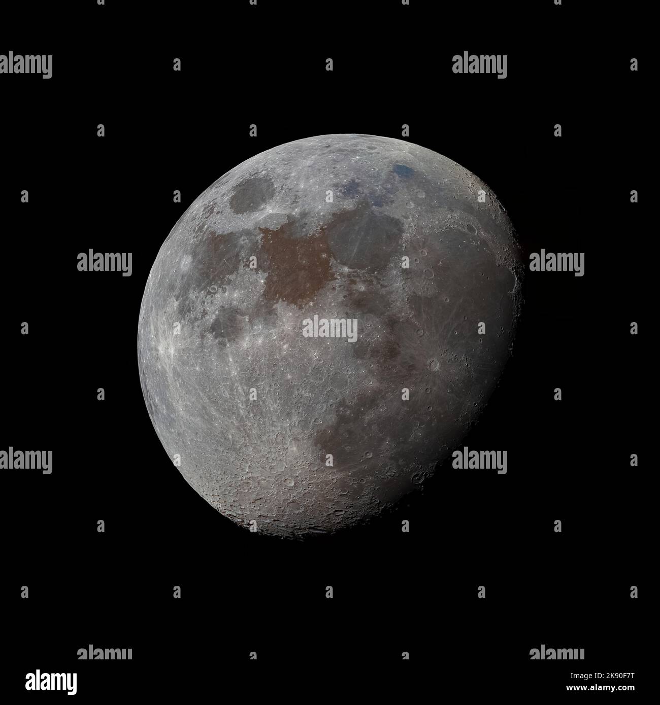 A vertical shot of the moon in the dark sky. Waning Gibbous Stock Photo ...