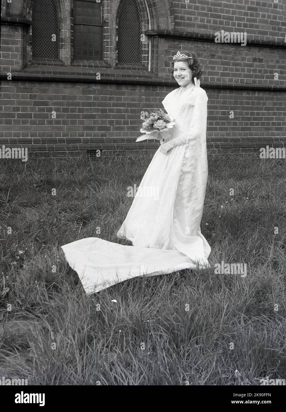 1961, historical, May Queen, a teenage girl in her gown and wearing a ...