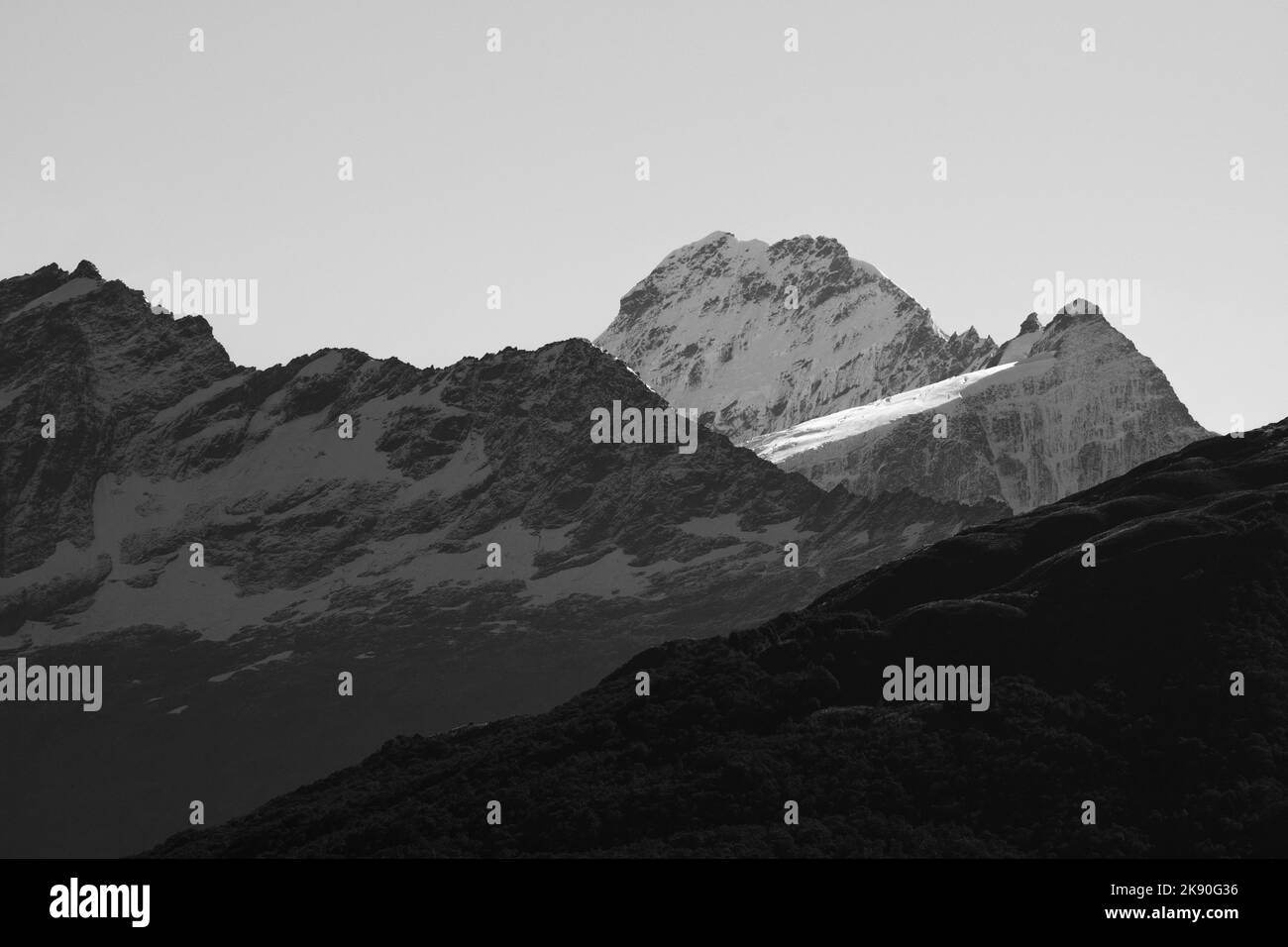 A grayscale shot of snowy alps Stock Photo - Alamy