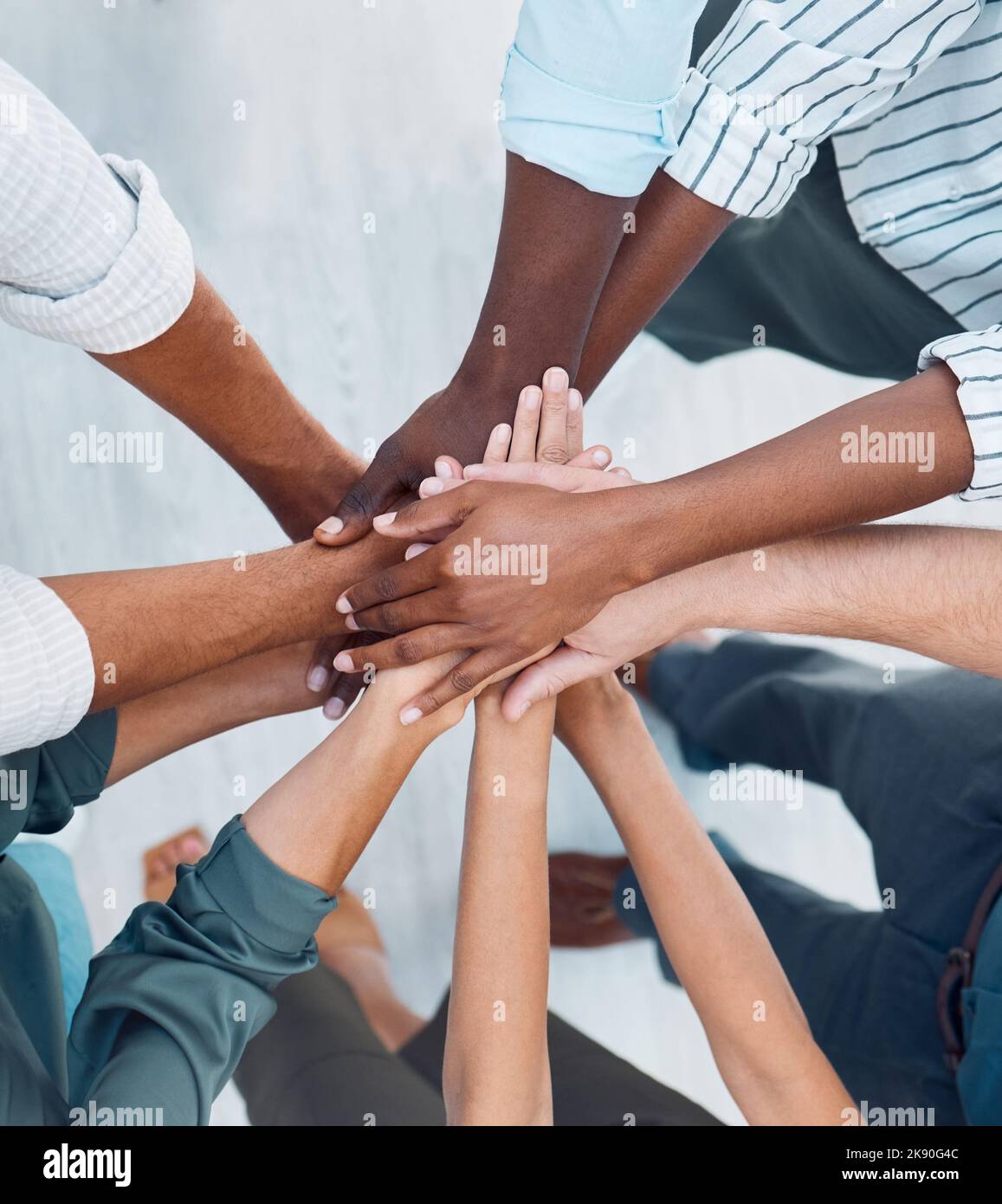 Diversity, hands and team above in support, trust and unity for ...