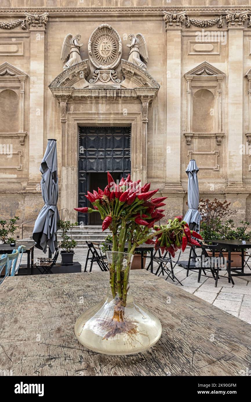 LECCE, ITALY - OCTOBER 14, 2022: Dried chilli table decoration with the ...