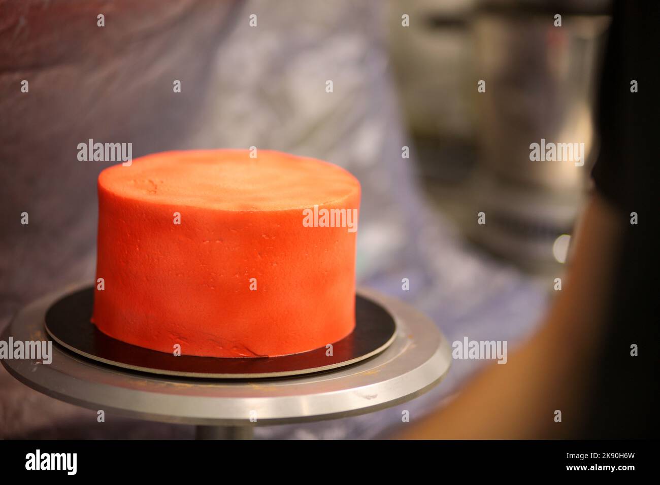 Baker preparing cake cream using hi-res stock photography and images ...