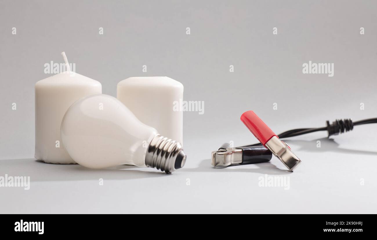 positive red bolts, negative black, with light bulb off and candles ...