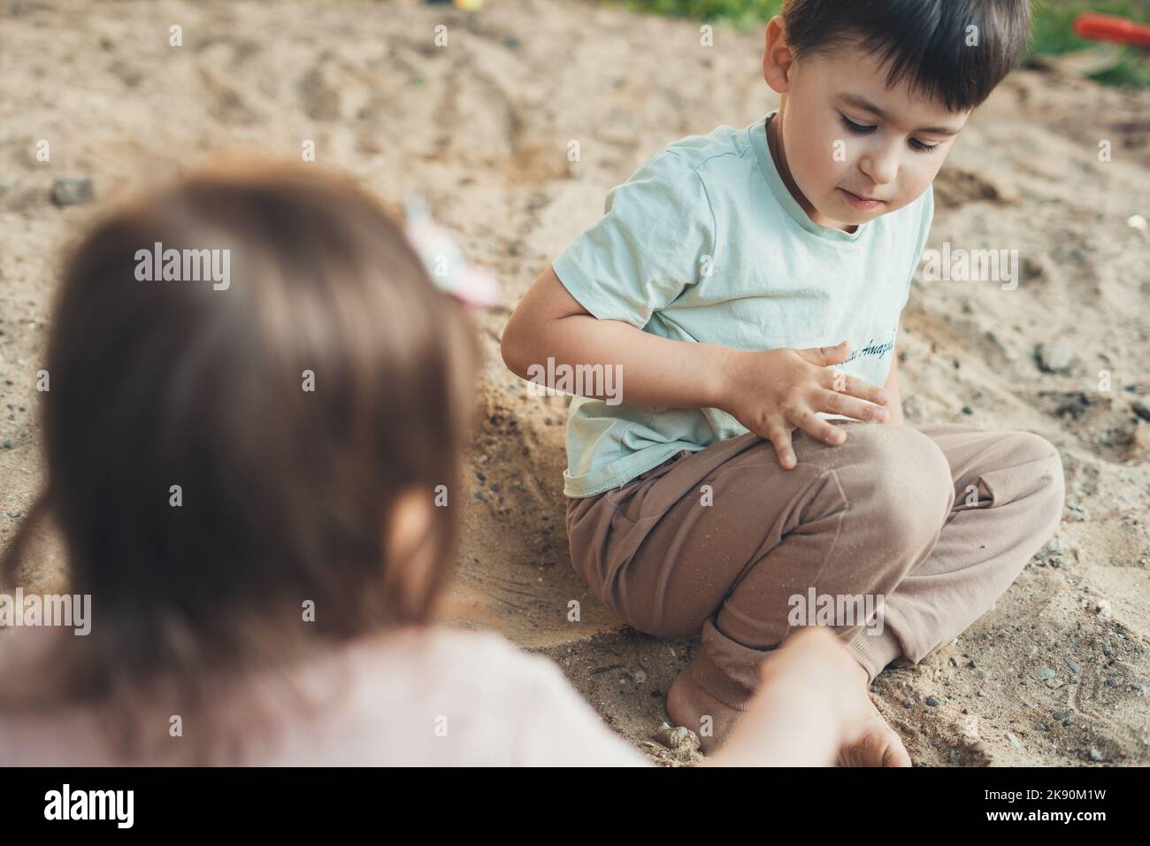 Child digging in the sand hi-res stock photography and images - Alamy