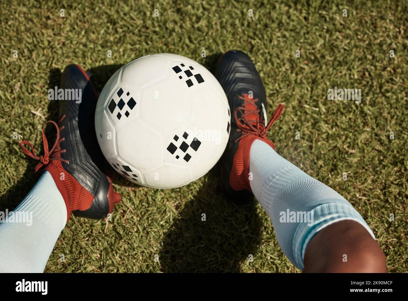 Soccer ball, grass field and shoes, soccer player and sport, athlete ...