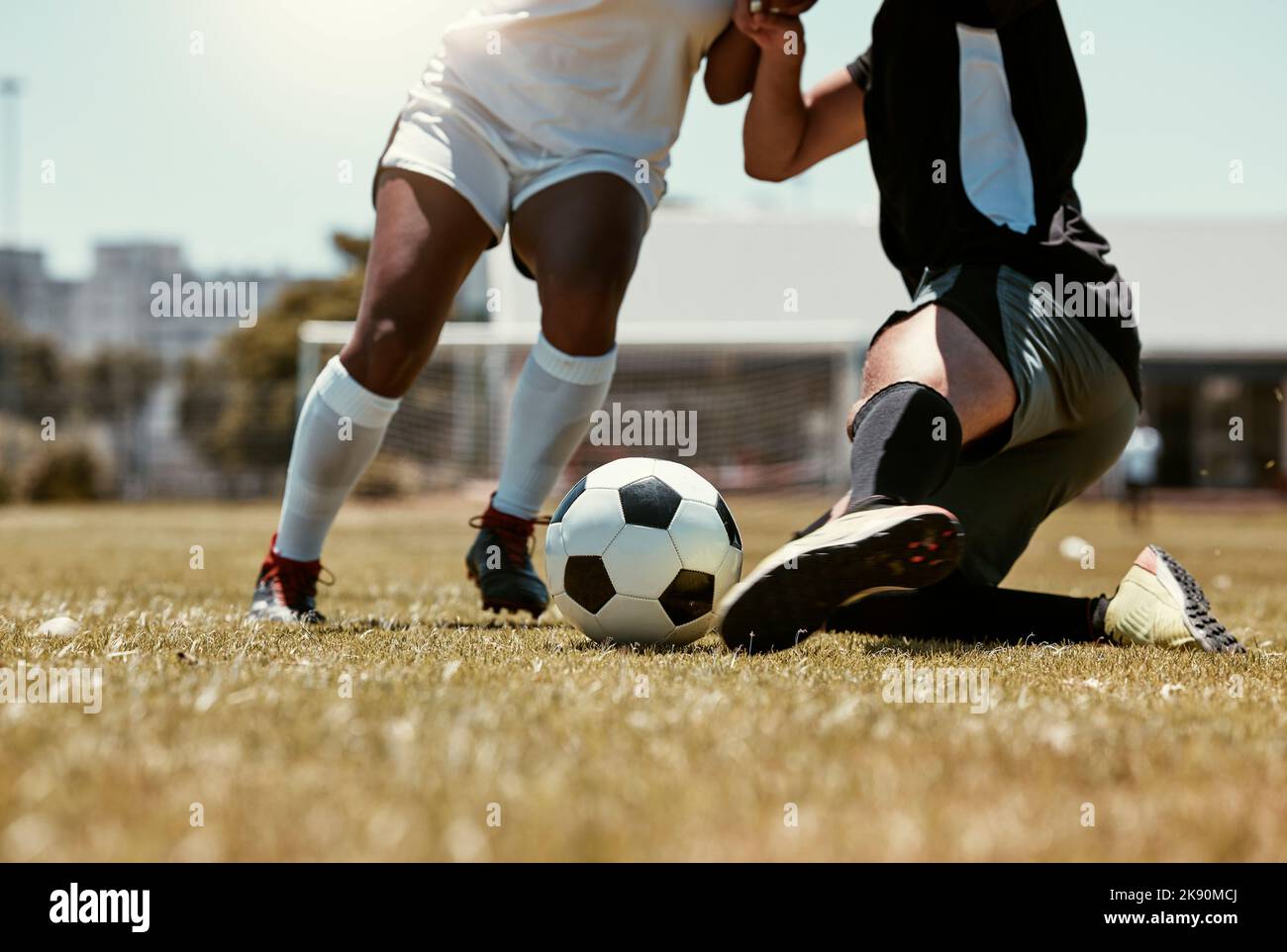Soccer, sports and athletes playing with a ball on an outdoor field for ...