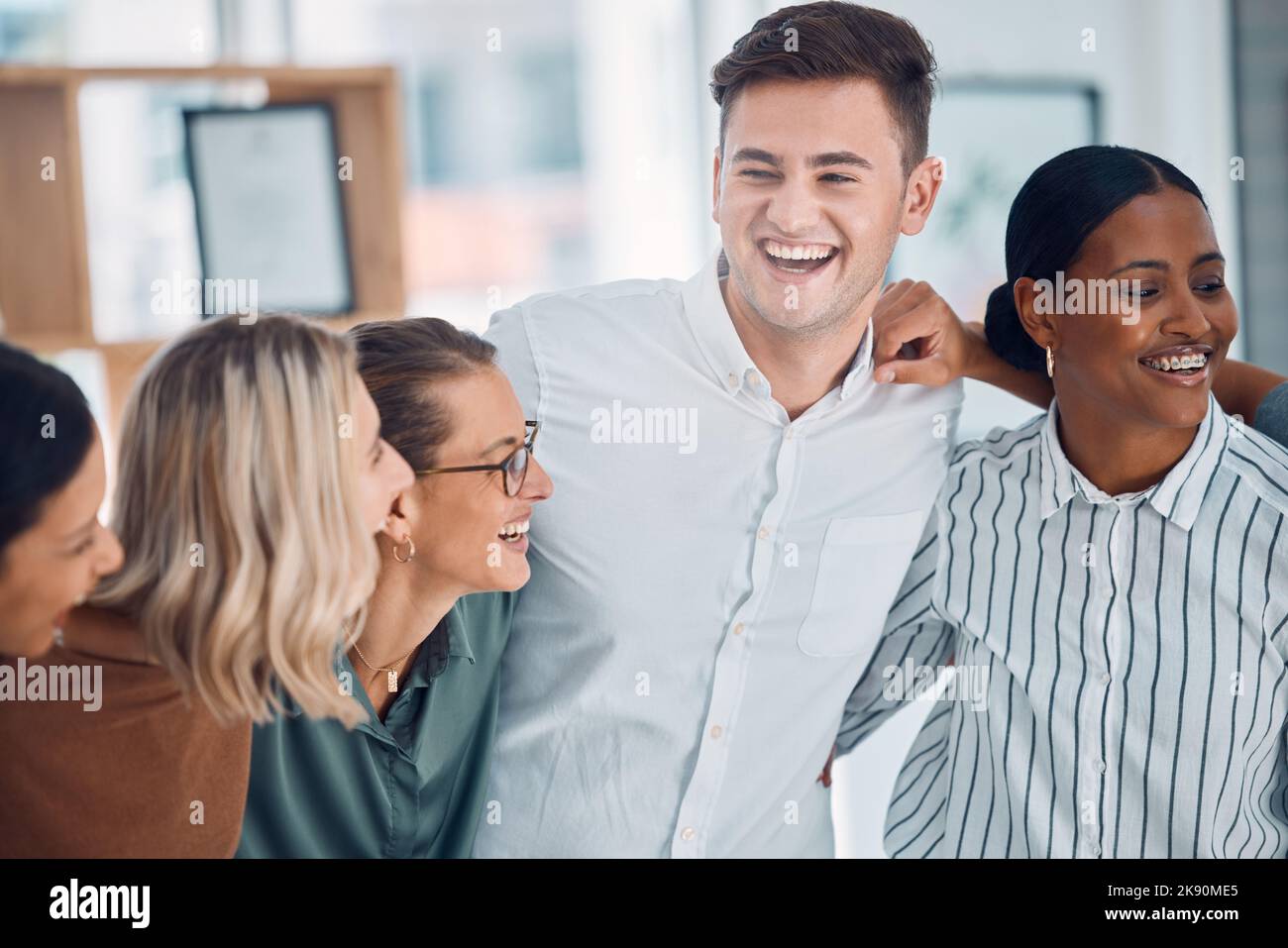 Happy, work friends and business people laughing together at a team ...