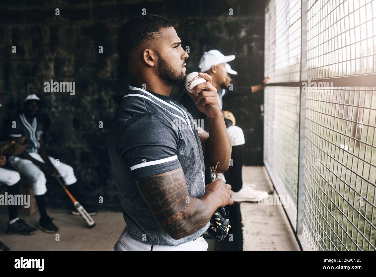 Baseball, man and watching game with a ball in a sports dugout with his ...