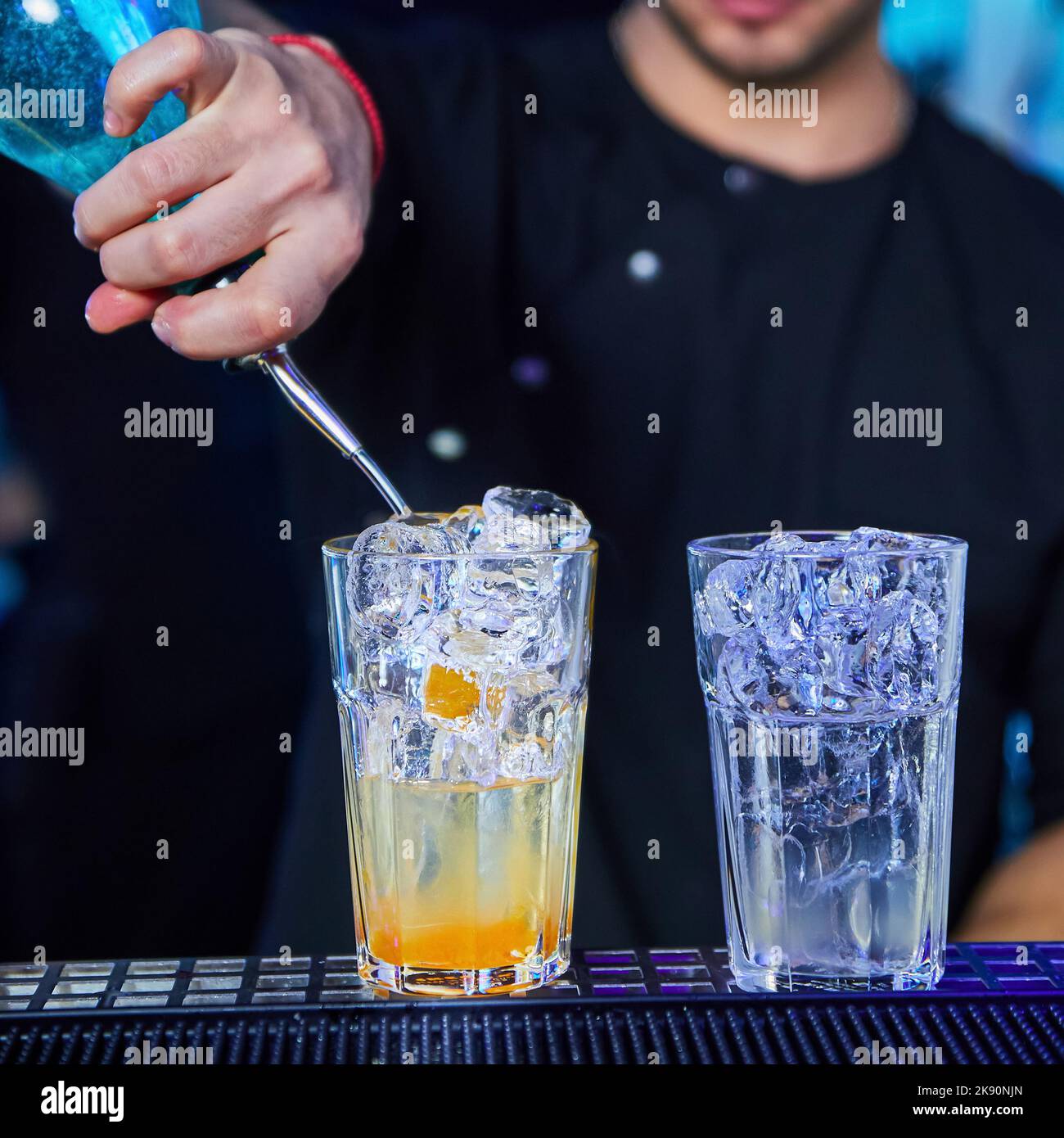 Bartender prepares cocktails bar hi-res stock photography and images - Alamy