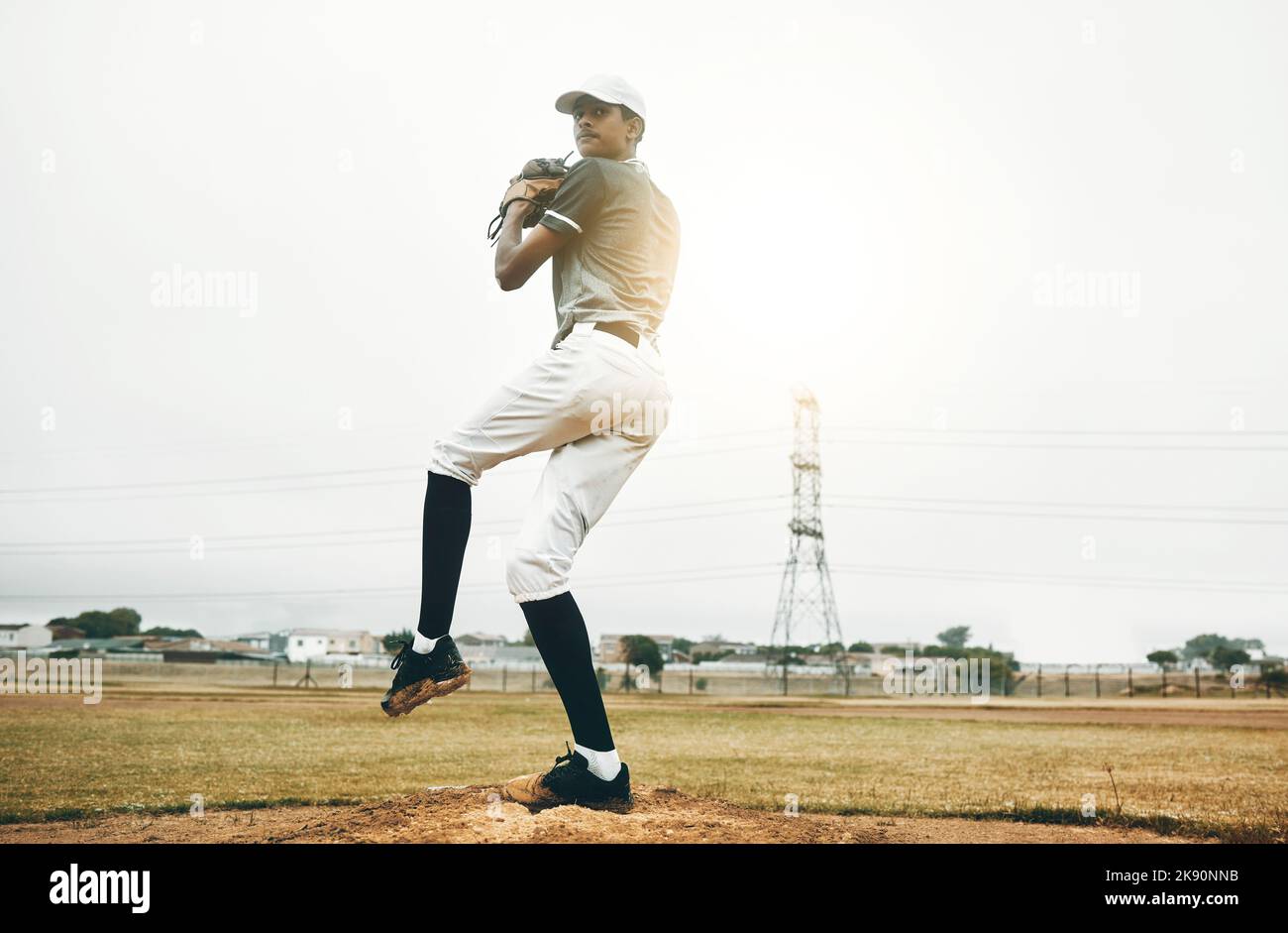 Baseball player, pitch and sports athlete man outdoor on a field with ...