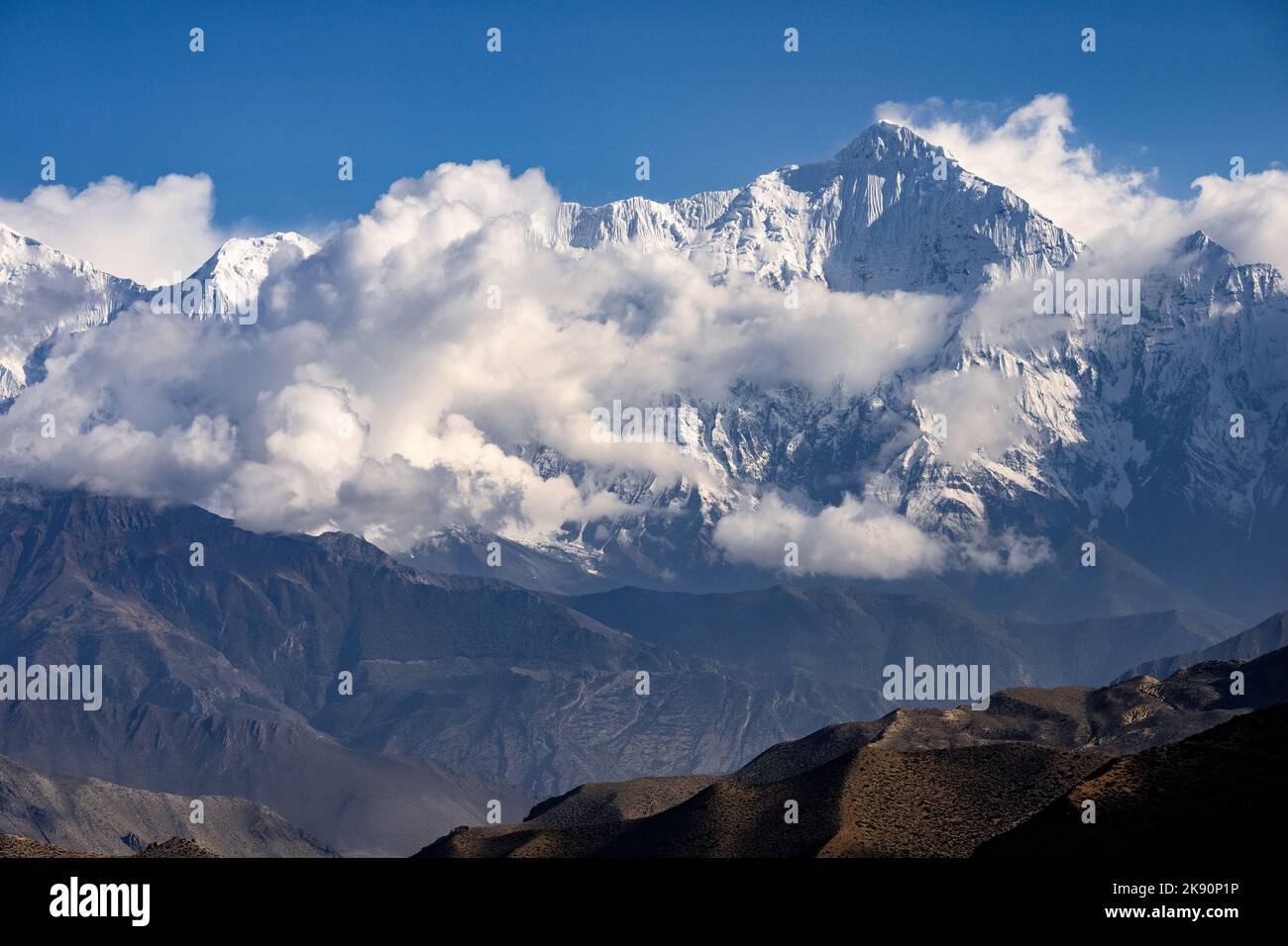 A beautiful shot of the snowy Annapurna and Nilgiri mountain ranges in the Himalayas, Nepal ...