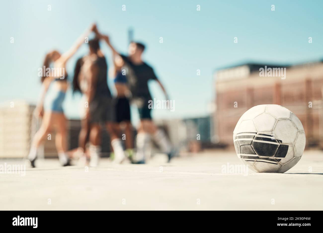 Soccer sports, team building and high five between friends on rooftop ...