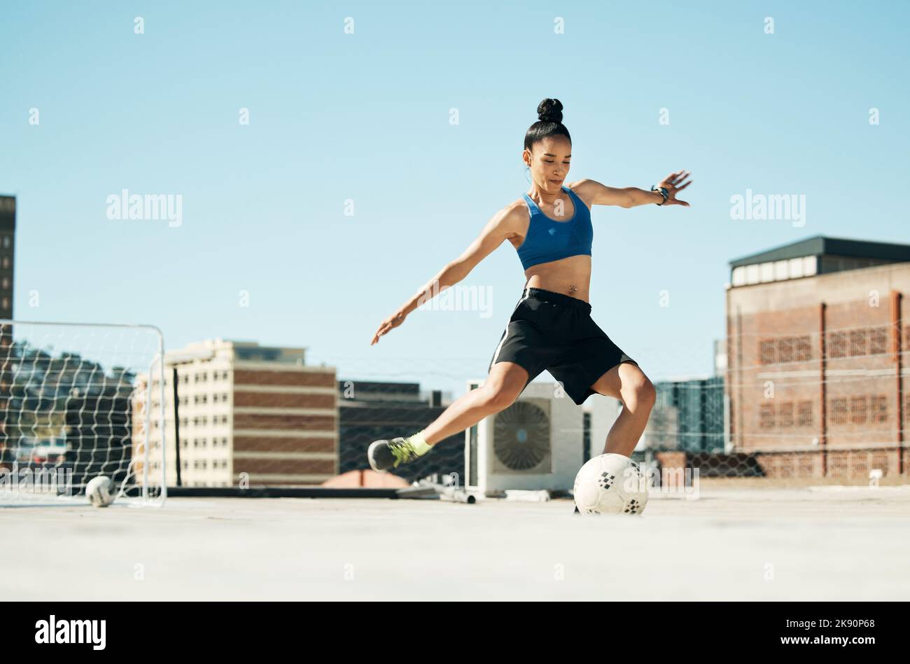 Soccer ball kick woman hi-res stock photography and images - Alamy