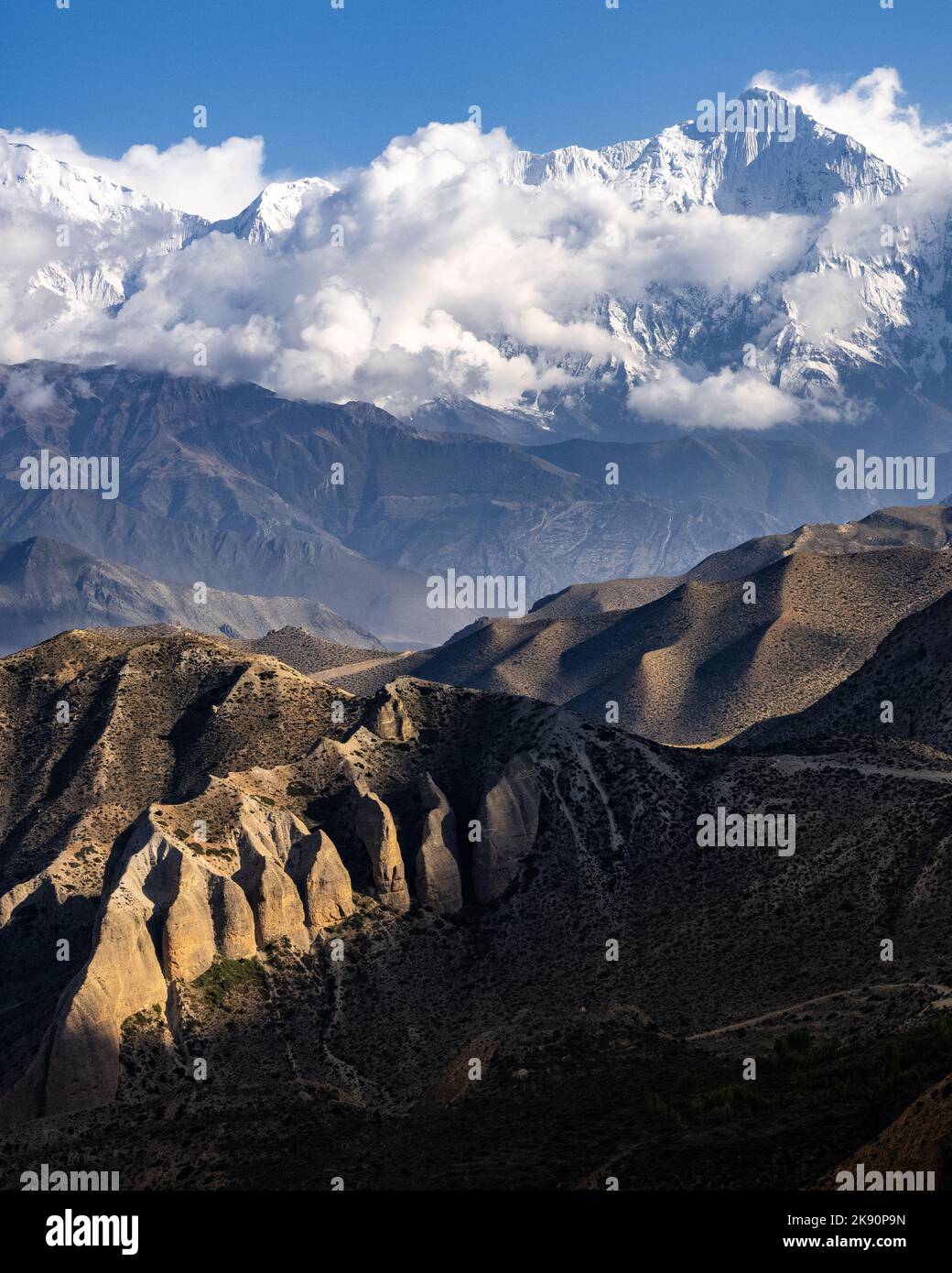 A vertical shot of the beautiful Nilgiri and Annapurna mountain ranges in the Himalayas, Nepal ...