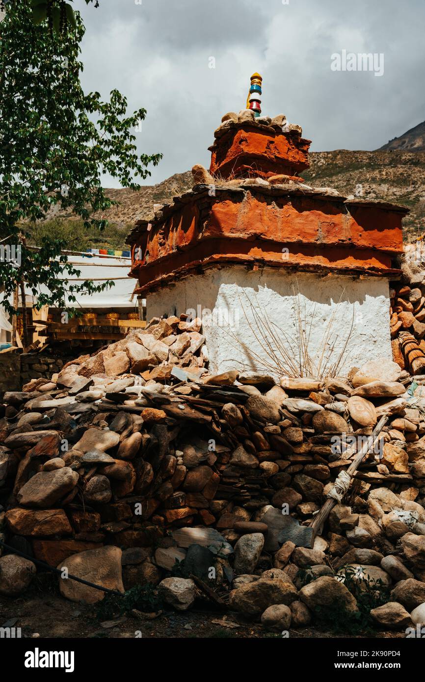 A vertical shot of the historic Tibetan Buddhist holy site Ghar Gumba ...